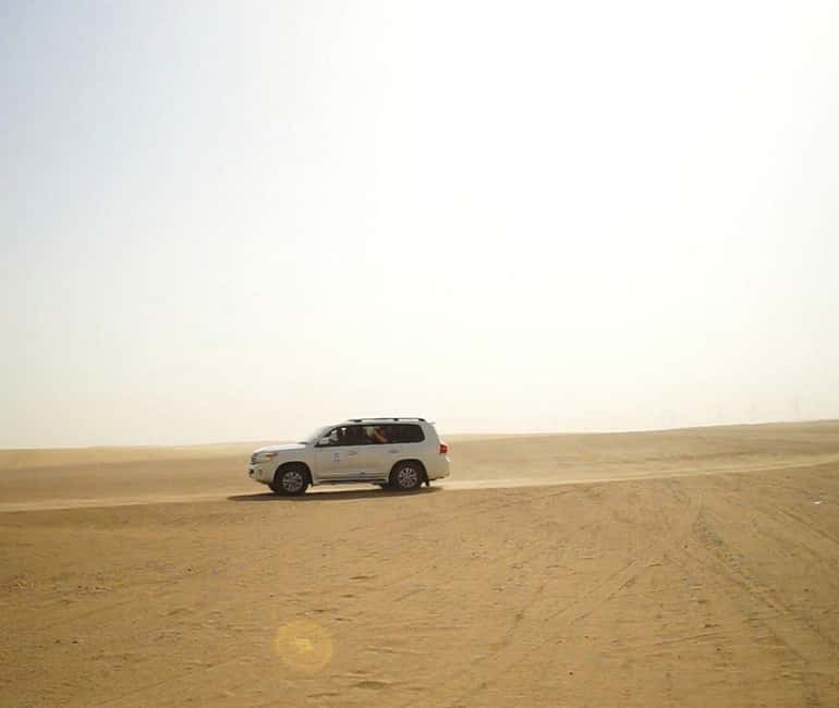 Guided Tour of Qatar’s Crystal Depths & Singing Sands | GetYourGuide