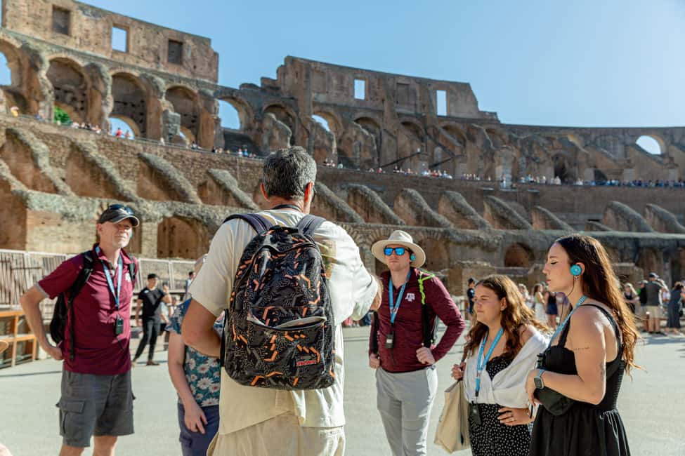 Colosseum Gladiators Gate with Roman Forum & Caesar's Palace | GetYourGuide
