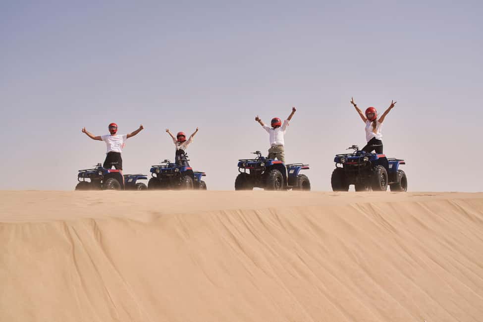 Doha: Quad Bike, Dune Bashing, Camel Ride & Inland Sea Tour | GetYourGuide