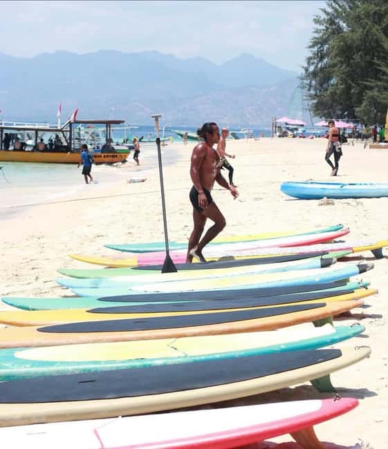best sunrise Stand-up paddle boarding (drone photoshoot) | GetYourGuide