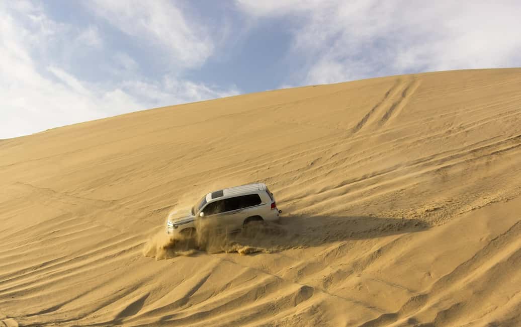 Doha: Desert Safari, Sandboarding, Dune Bashing & Inland Sea | GetYourGuide