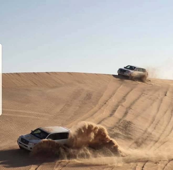 Doha: Desert Safari Dune Bashing, Sandboarding, & Camel Ride | GetYourGuide