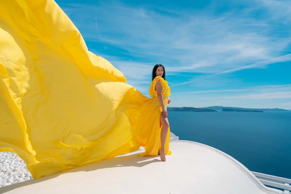 Santorini: Unique Flying Dress Photoshoot Experience | GetYourGuide