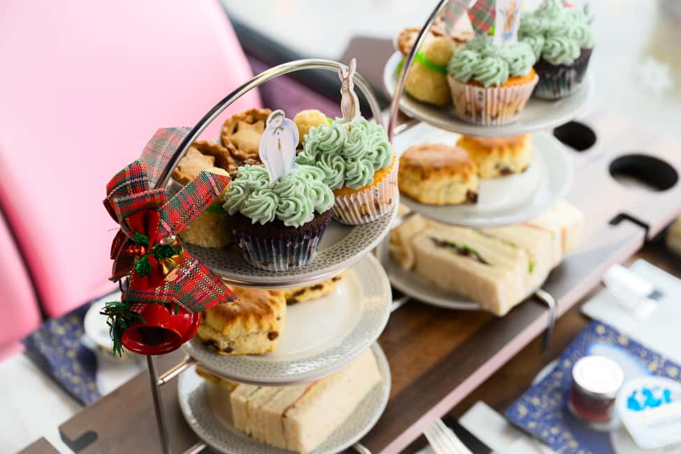 London: The Snowman Afternoon Tea Bus Christmas Tour | GetYourGuide