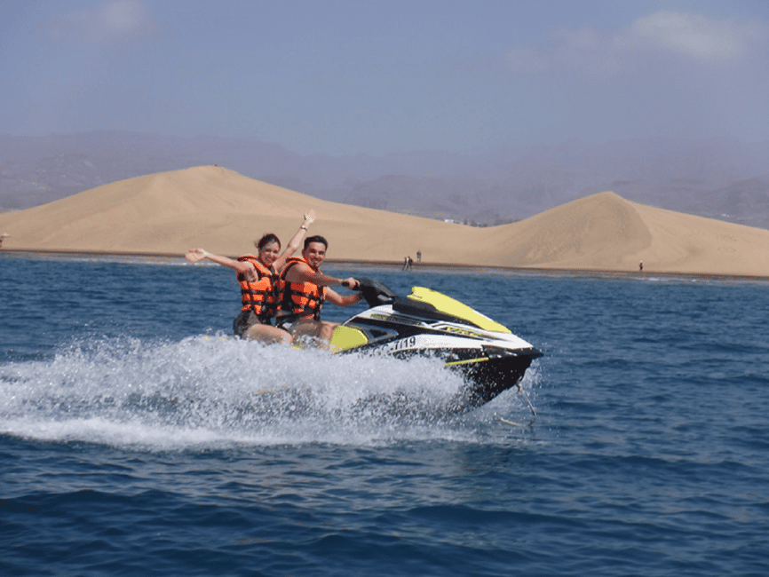 Rent e-Scooter + option Rent Jet Ski front Maspalomas Dunes | GetYourGuide