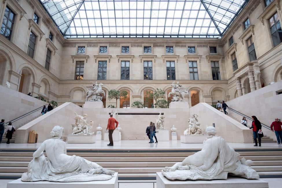 Paris: Louvre Museum Access with Host and Hop-On Hop-Off Bus | GetYourGuide