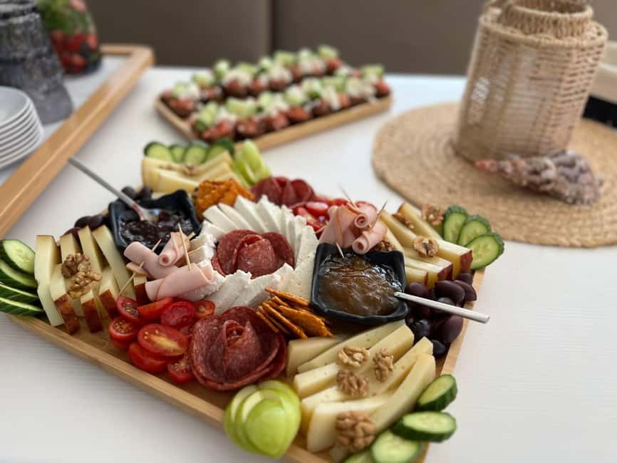 Luxury Dia Catamaran Cruise: Chef Dinner, Drinks & Sunset | GetYourGuide