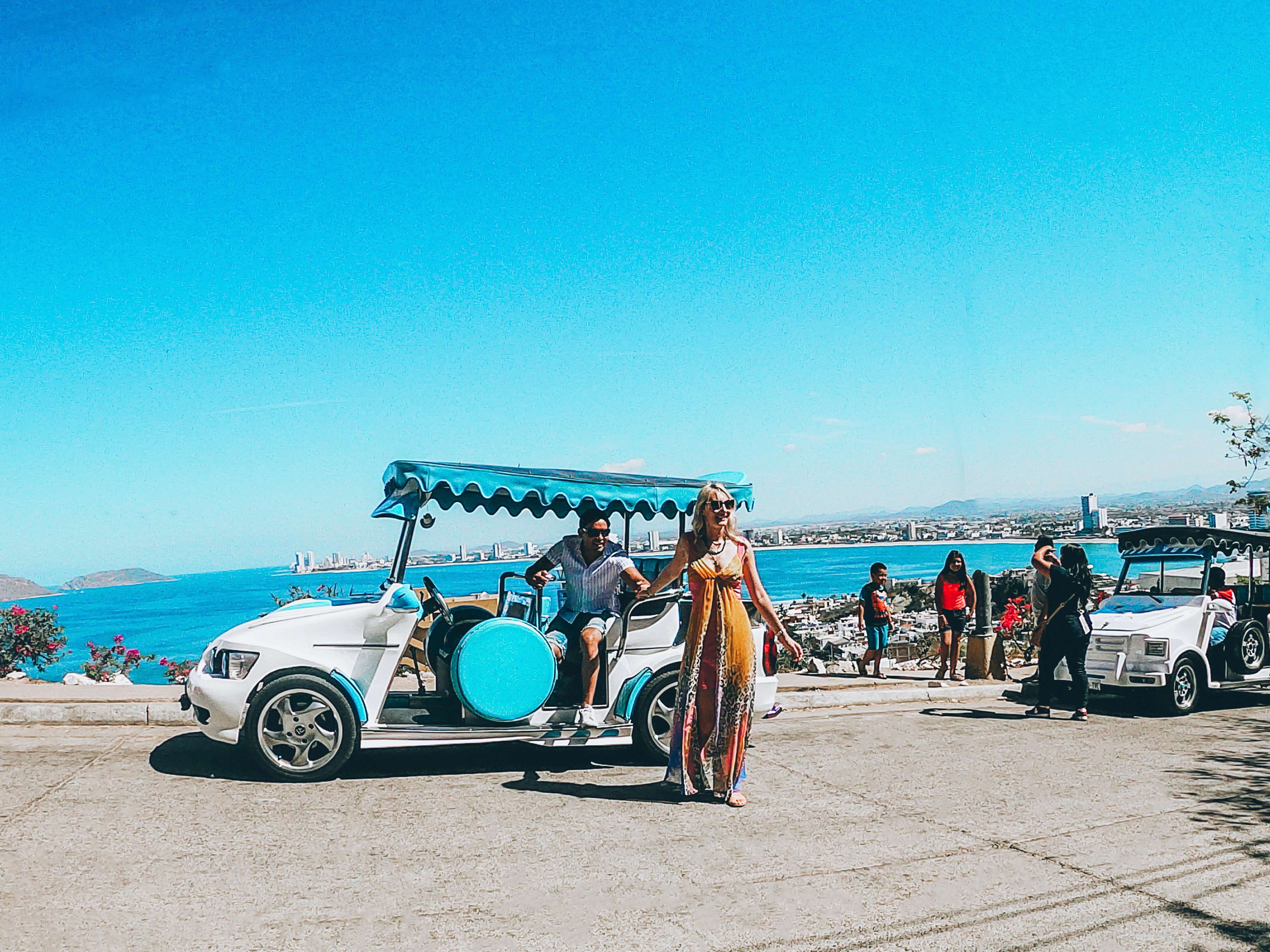 Mazatlan: City Tour in a Traditional "Pulmonia" Open-Air Car | GetYourGuide