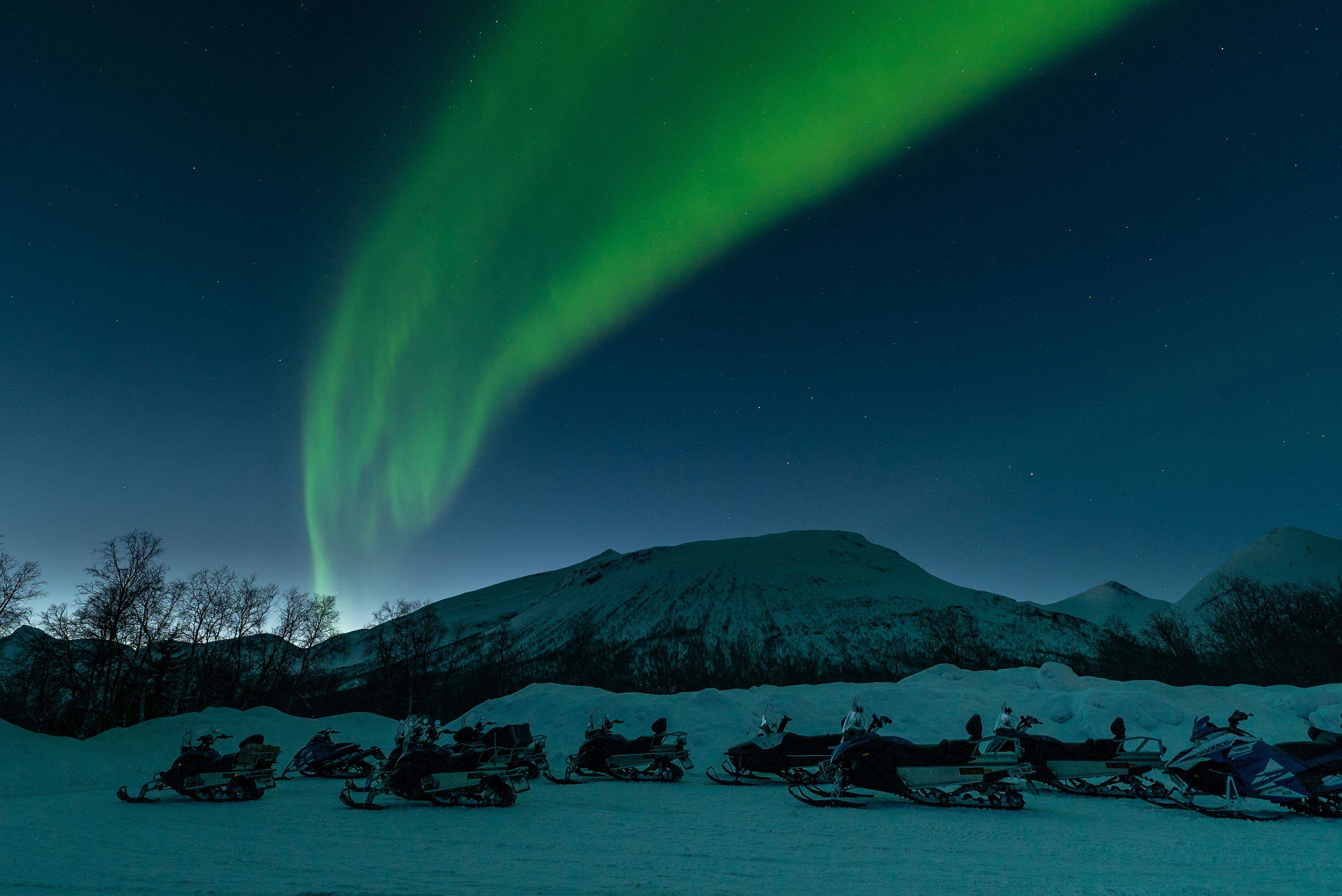 From Tromsø: Evening Snowmobiling Tour at Camp Tamok | GetYourGuide