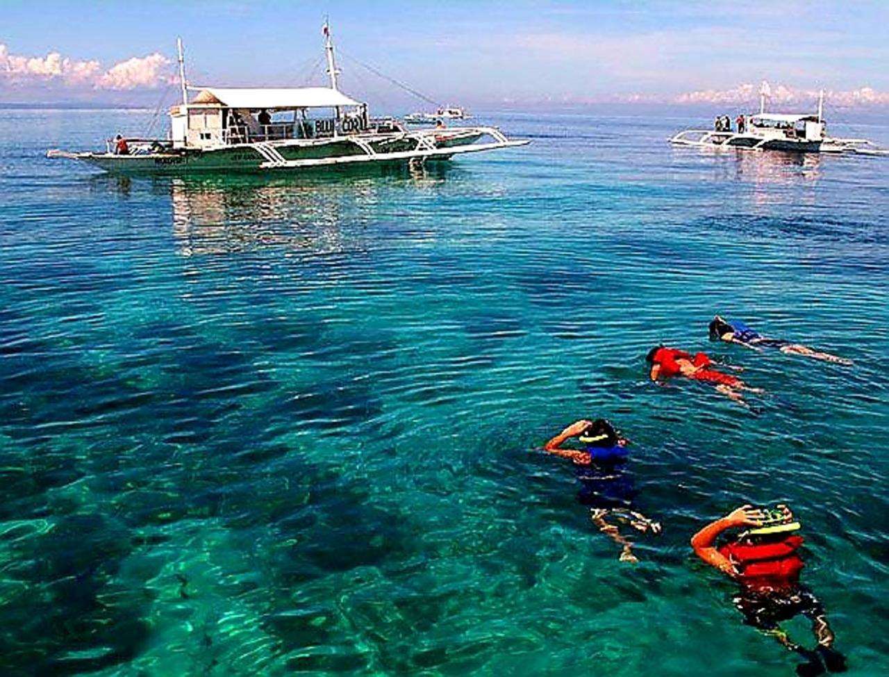 Mactan Island Hopping Gilutungan, Caohagan, Nalusuan + Lunch | GetYourGuide