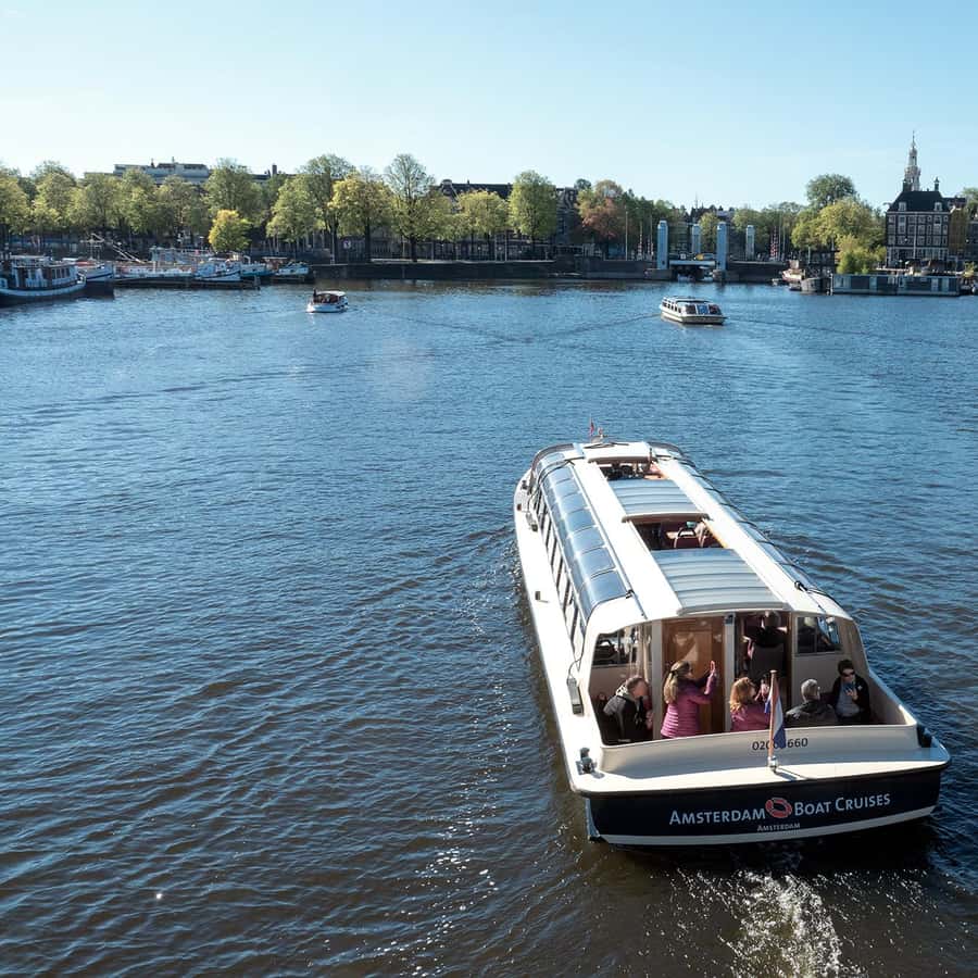 Amsterdam: Canal Cruise with Live Commentary & Audio Guide | GetYourGuide