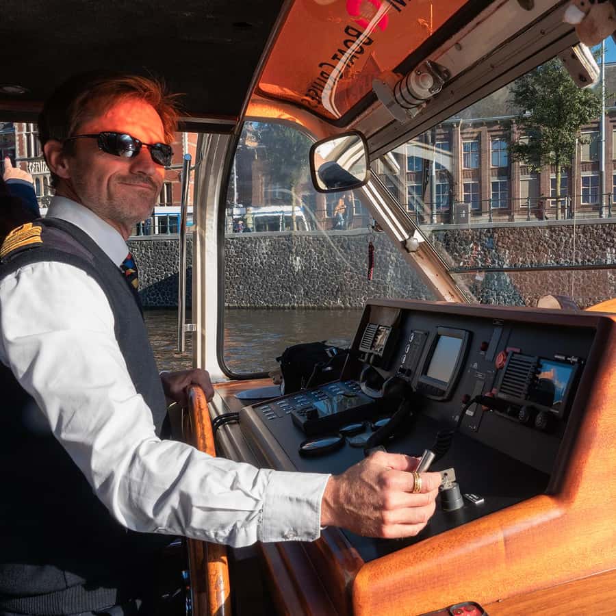 Amsterdam: Canal Cruise with Live Commentary & Audio Guide | GetYourGuide