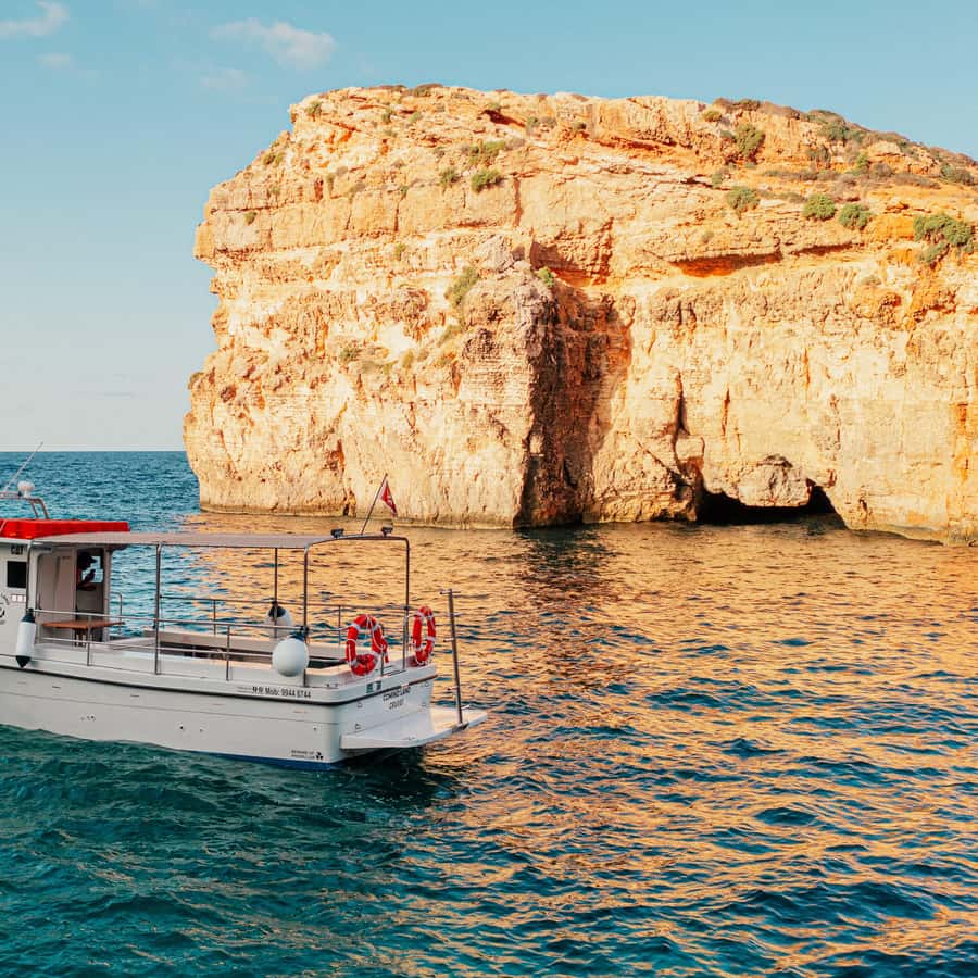 Malta: Blue Lagoon, Crystal Lagoon & Sea Caves Boat Tour | GetYourGuide