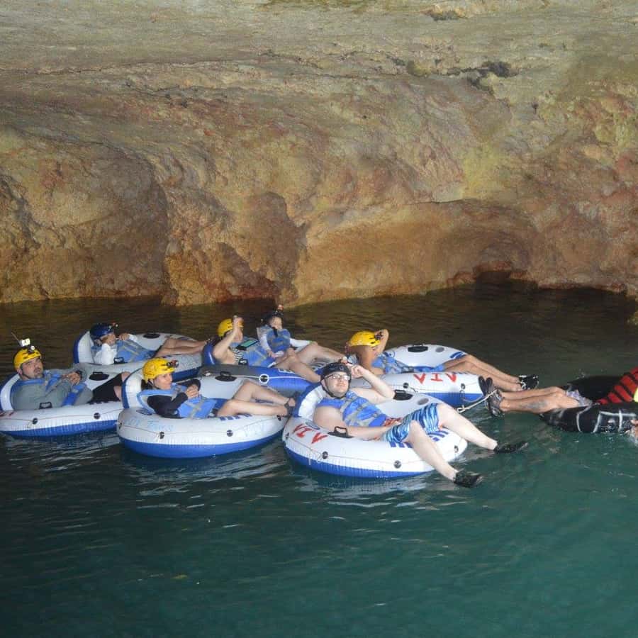 Belize City: Cave Tubing, Crystal Cave, or Ziplining Tour | GetYourGuide