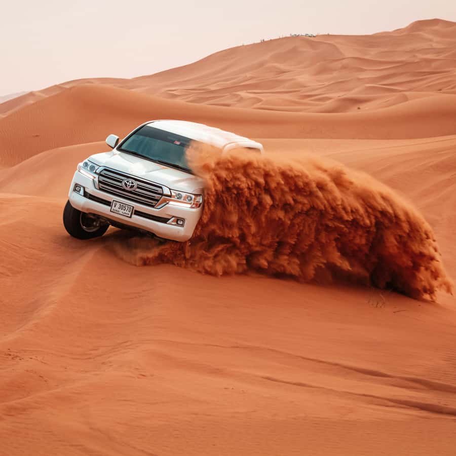 Doha: Sunrise Desert Safari with Dune Bashing and Inland Sea | GetYourGuide