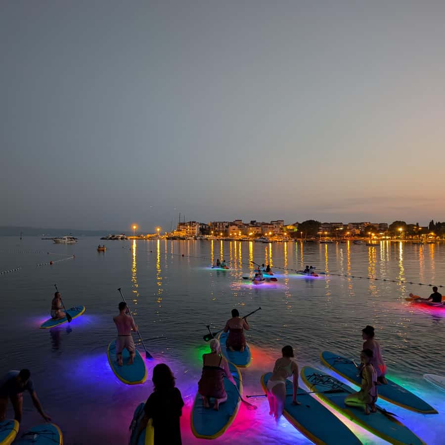 Split: Stand Up Paddleboard Night Glow Tour | GetYourGuide