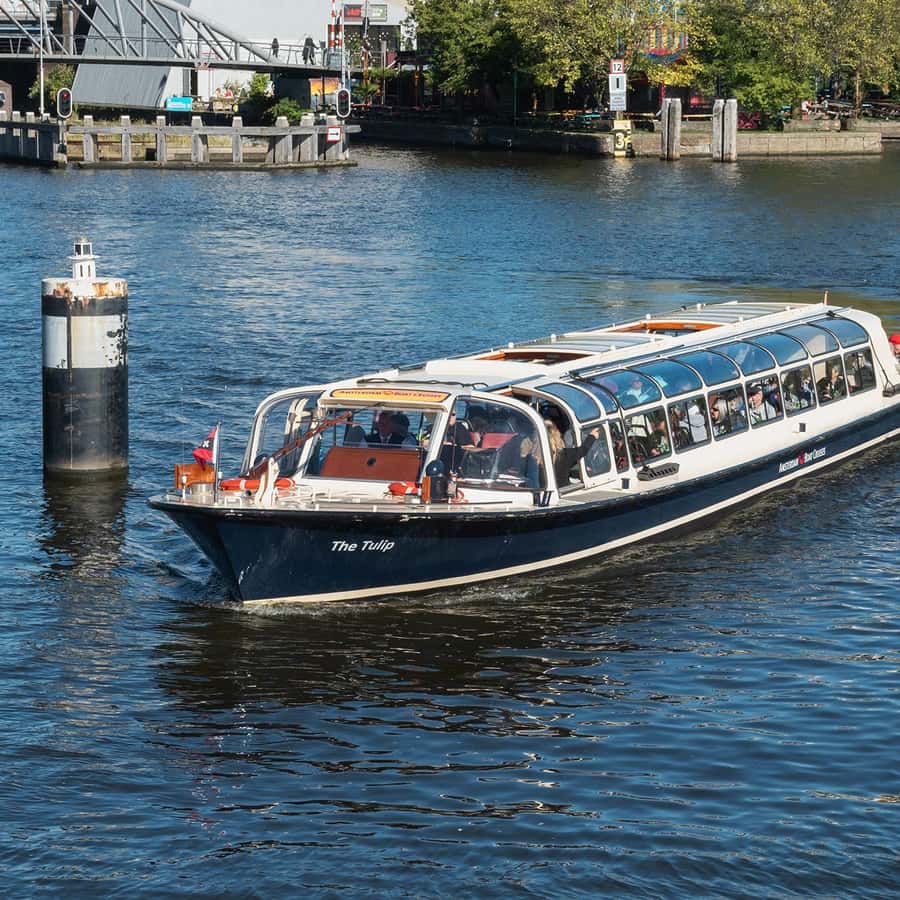 Amsterdam: Canal Cruise with Live Commentary & Audio Guide | GetYourGuide