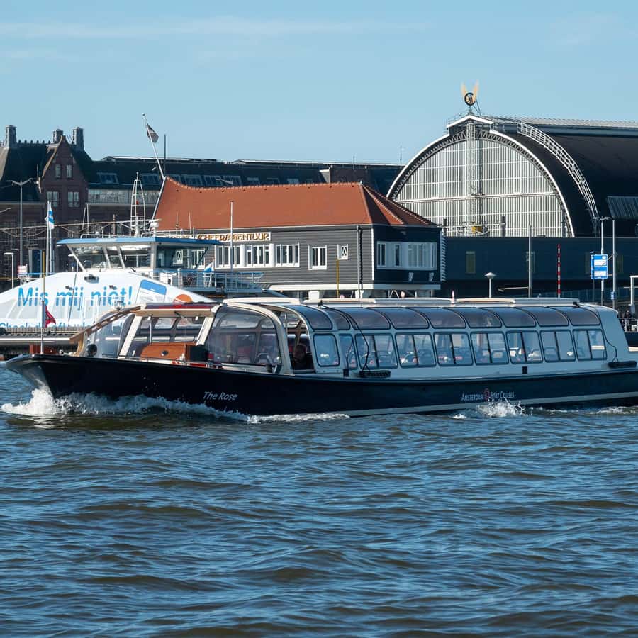Amsterdam: Canal Cruise with Live Commentary & Audio Guide | GetYourGuide