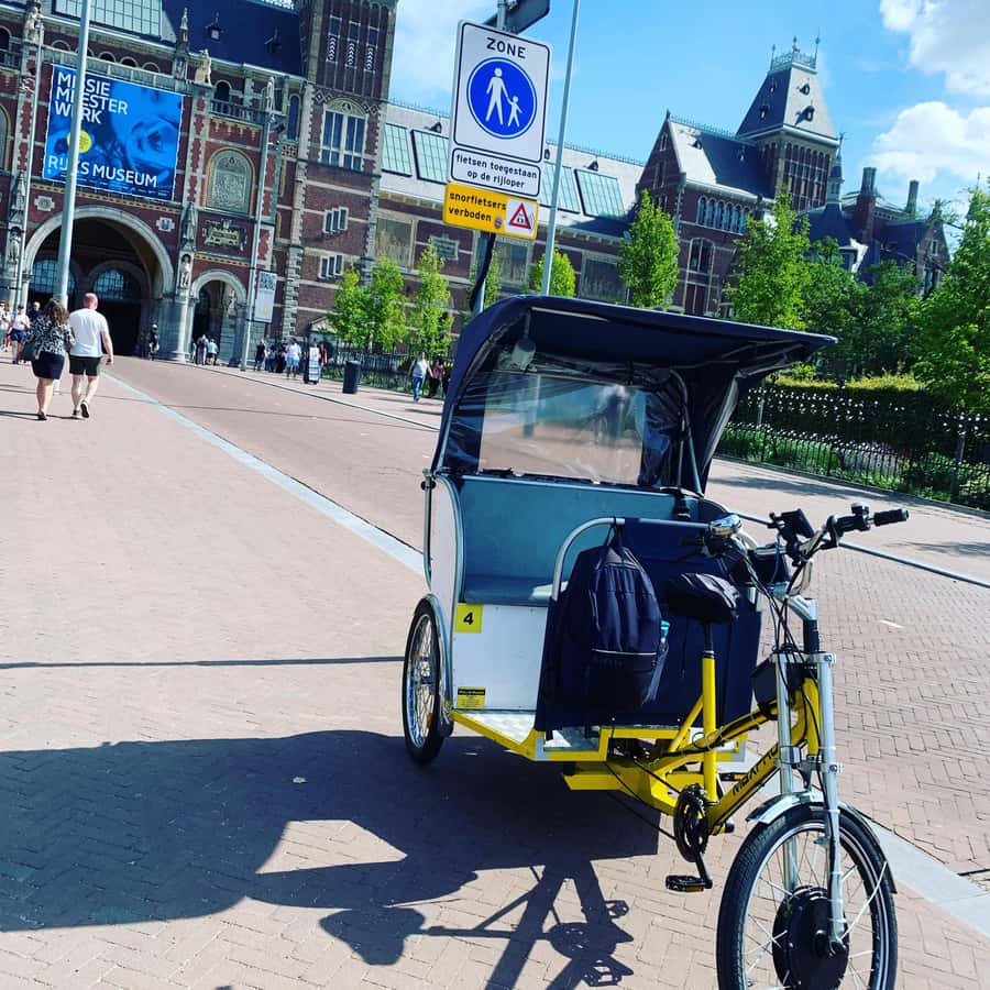 Amsterdam : Visite privée en cyclo-pousse avec guide local | GetYourGuide