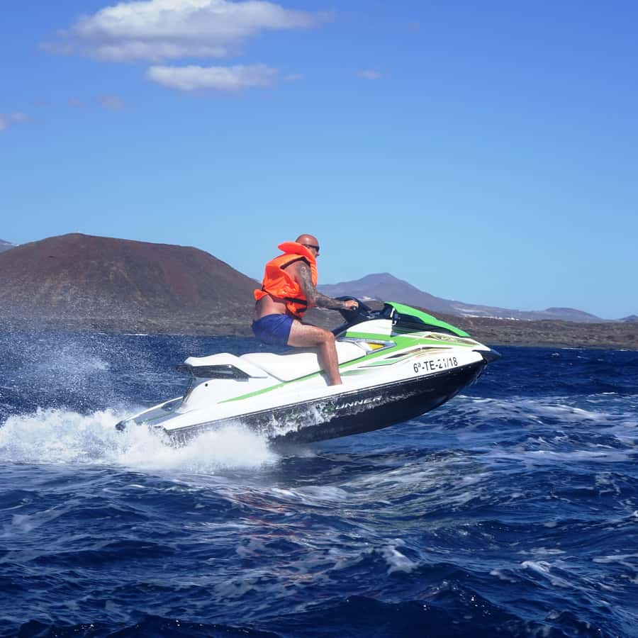 Single Jet Ski Ride with Pickup & Drop-off in Tenerife South | GetYourGuide