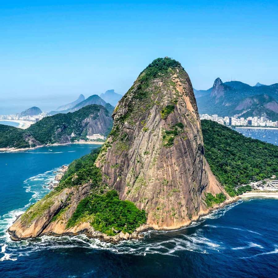 Climbing the Via Ferrata in Sugarloaf Mountain, the largest in Brazil ...