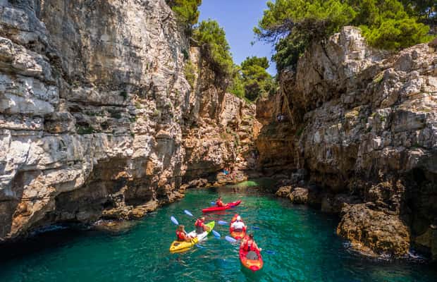 Pula: Kayak Adventure with Cave & Island Snorkeling | GetYourGuide