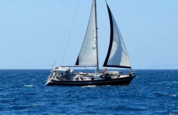 Santorini: Sailing Yacht cruise with full meal and drinks | GetYourGuide