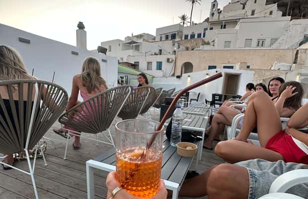 Ios: Mamma Mia Rooftop Cinema at Sunset with Drink & Popcorn | GetYourGuide