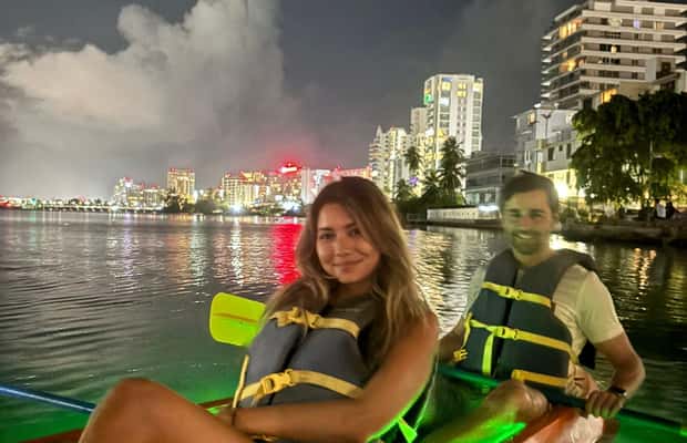 San Juan: Condado Lagoon by Night on an LED Crystal Kayak | GetYourGuide