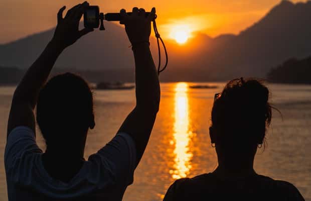 Luang Prabang First Day: EV City Tour & Sunset Cruise | GetYourGuide