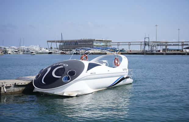 Boat ride to Cova Tallada with optional swim stop | GetYourGuide