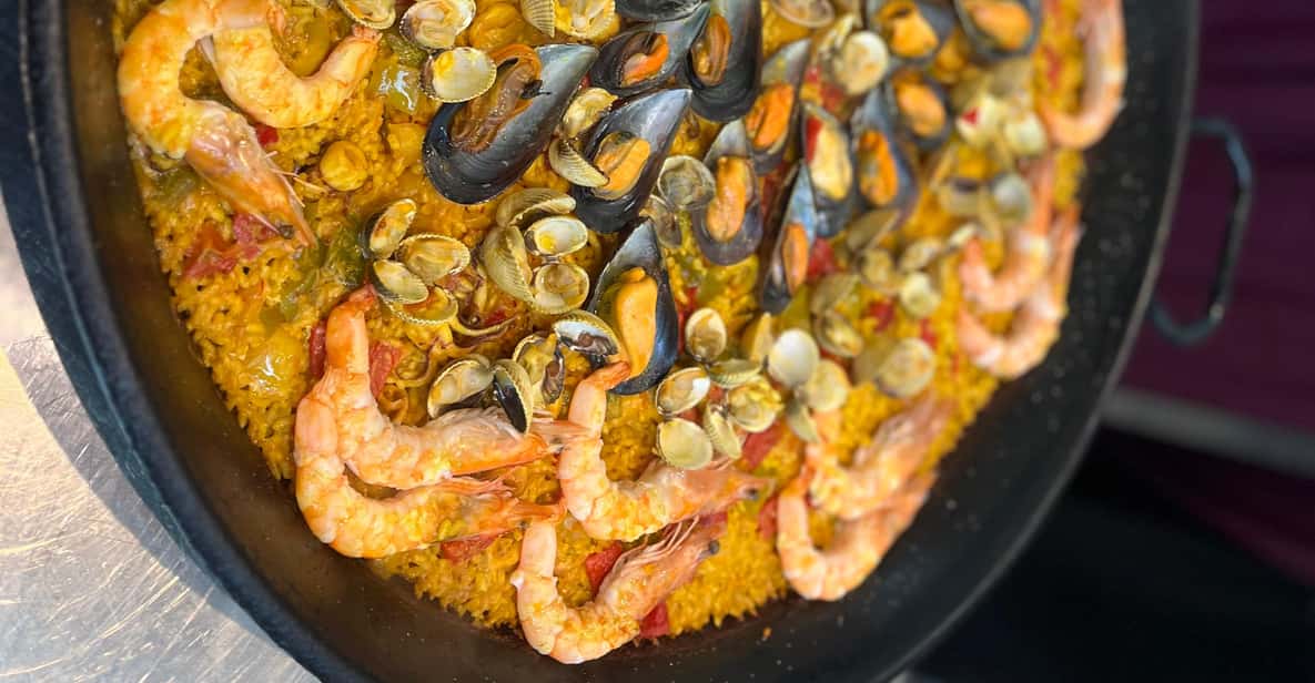 Barcelona: Paella Cooking Class with Market Visit and More | GetYourGuide
