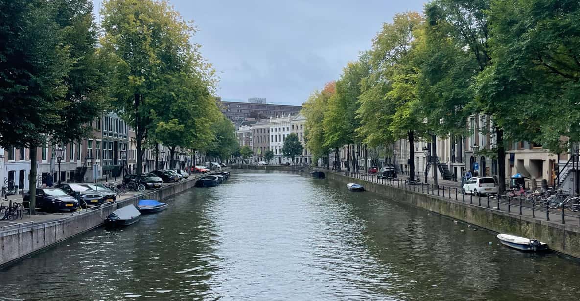 Amsterdam Small Group Canal Cruise Including Snacks & Drinks | GetYourGuide