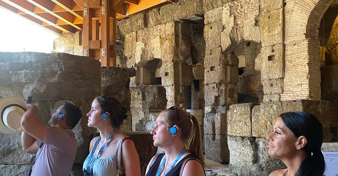 Colosseum Gladiators Gate with Roman Forum & Caesar's Palace | GetYourGuide