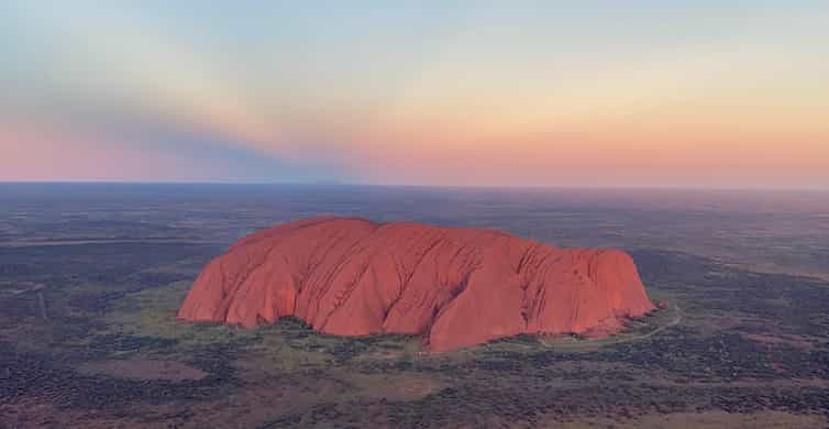 Yulara: Uluru and Kata Tjuta Sunset Helicopter Tour | GetYourGuide