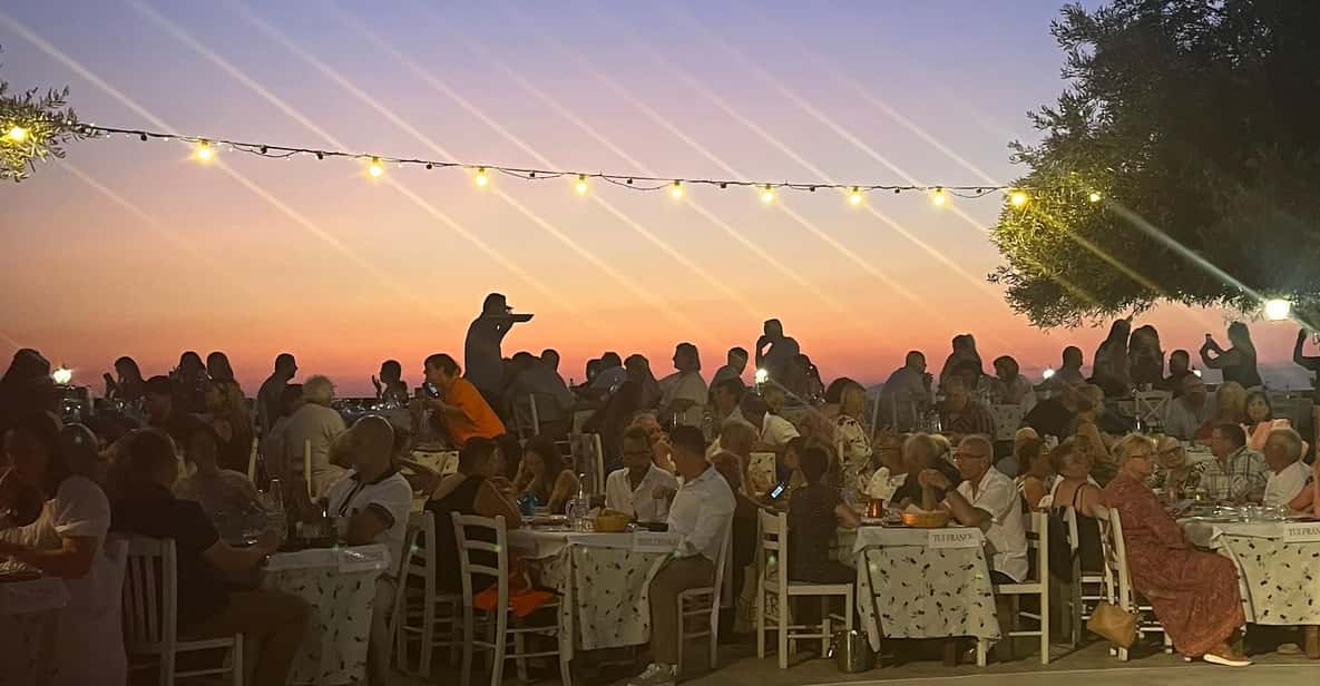 Kos: Greek Dinner with Music, Dancing, and Unlimited Wine | GetYourGuide