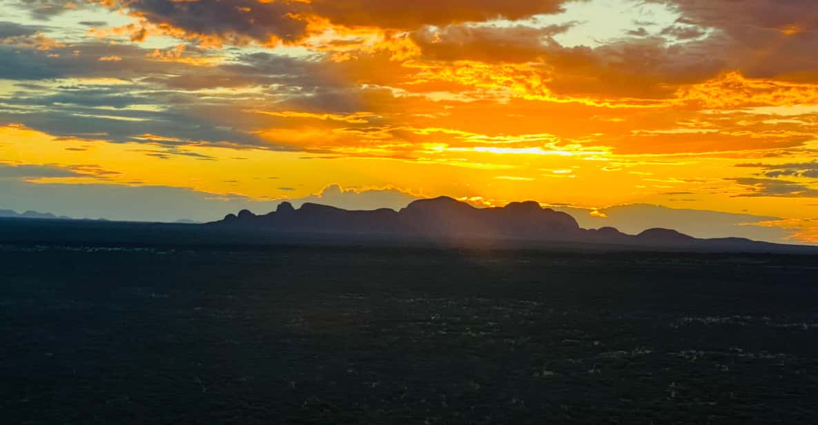 Yulara: Uluru and Kata Tjuta Sunset Helicopter Tour | GetYourGuide
