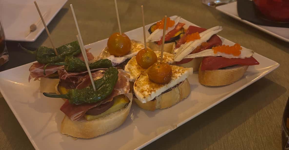 Barcelona: Tapas Walking Tour with Food, Wine, and History | GetYourGuide