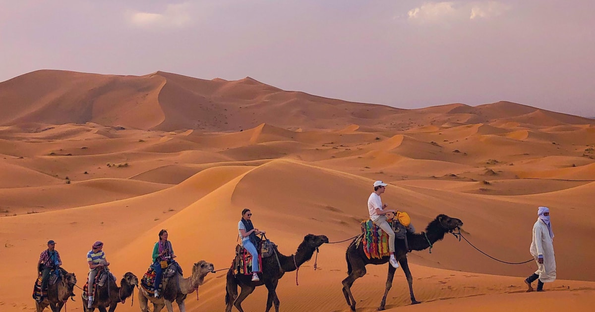 From Merzouga: Sunset Camel Ride | GetYourGuide