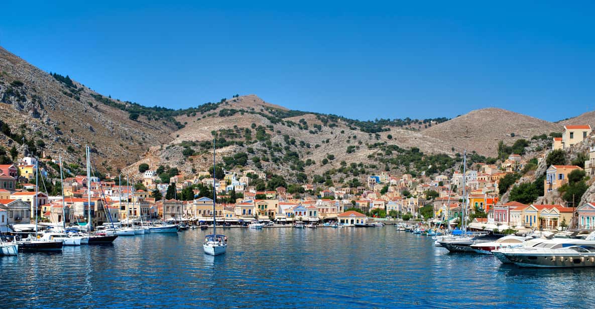 Rhodes: Boat trip to Symi island with swimming at St. George | GetYourGuide