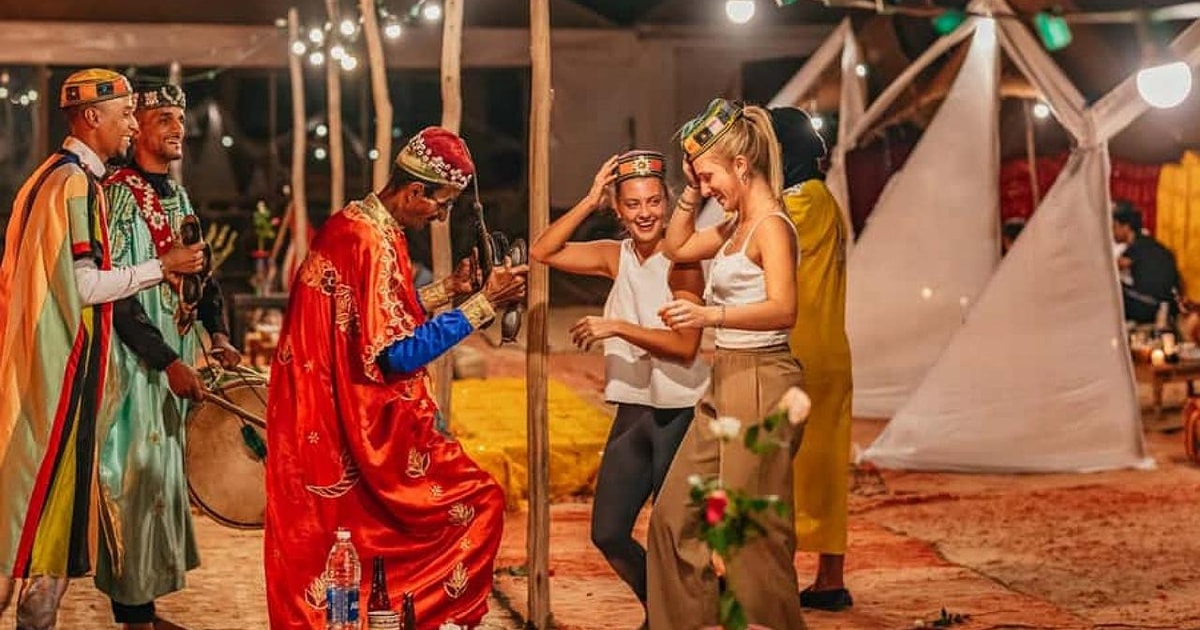 1 night agafay desert tour with camel ride & dinner show | GetYourGuide