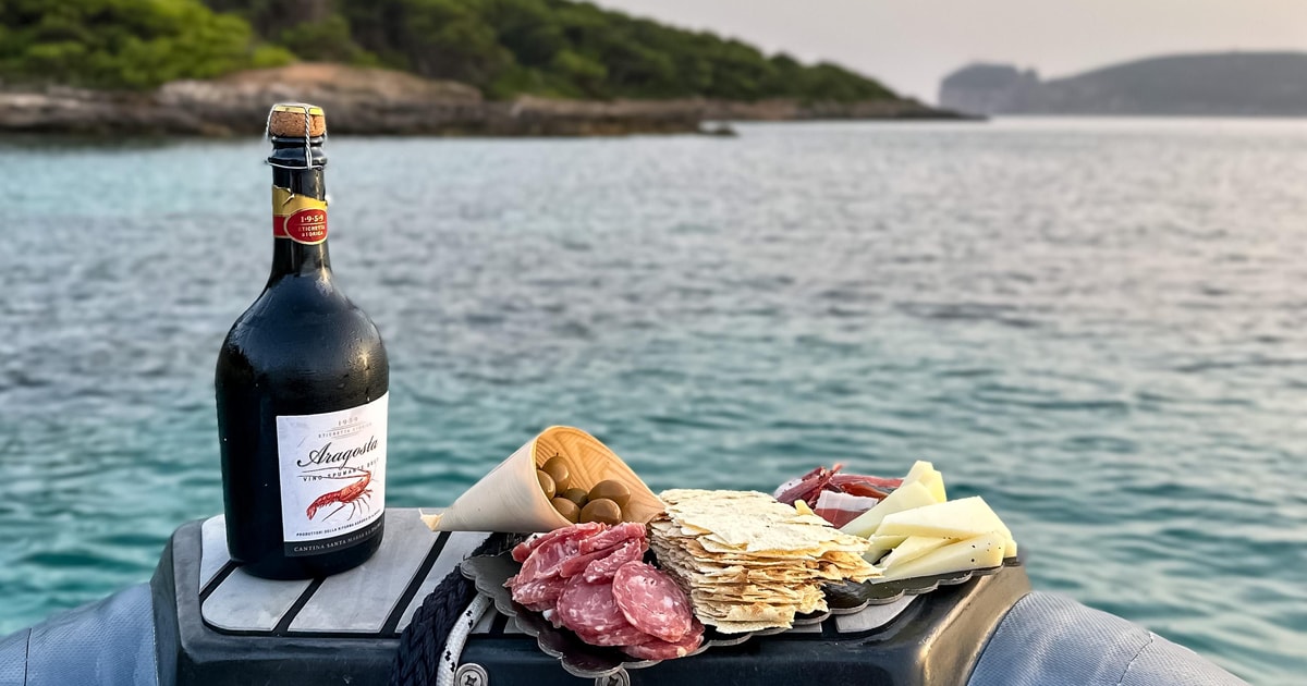 Alghero: tour in barca con aperitivo al tramonto Porto Conte | GetYourGuide