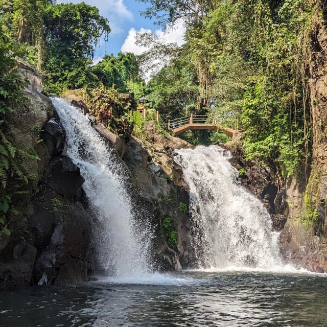 Jumping Sliding at Aling- Aling Waterfall and Handara Gate | GetYourGuide