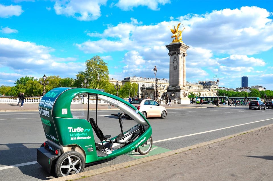 Juegos de París Tour Privado en Rickshaw con Audioguía | GetYourGuide