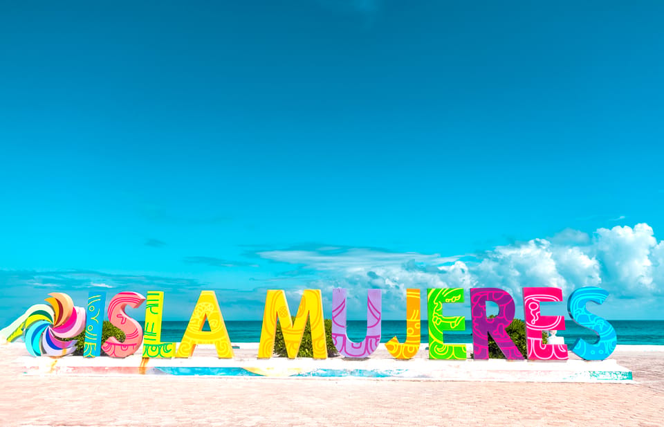 Desde Cancún: tour de un día en barco por la playa y esnórquel en Isla ...