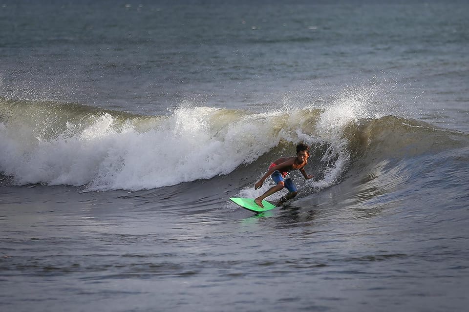 Catching the wave | Surf in Lombok | GetYourGuide