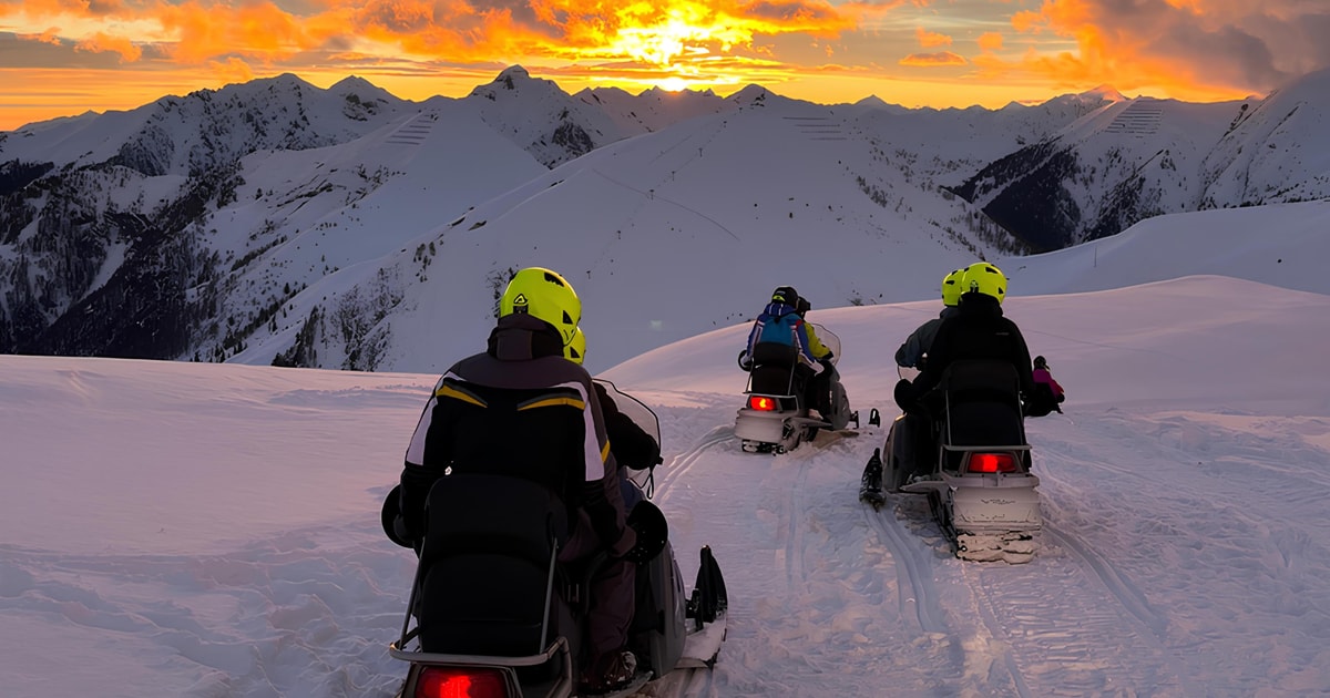 Alps: Sunset Snowmobile Tour with Aperitif from Foppolo | GetYourGuide