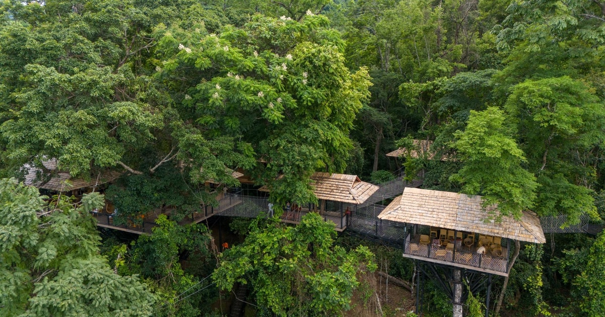 Kuang Si Waterfall, Tree Top Cafe, Ziplining and Lunch | GetYourGuide