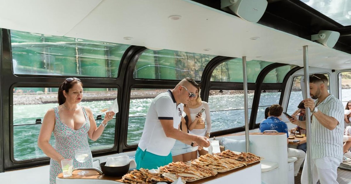 Lisbon Sangria – Exclusive Luxury Cruise with Pizza & Music | GetYourGuide