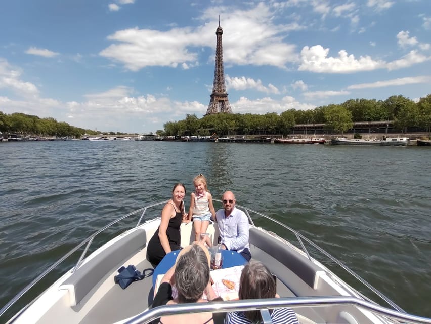 Paris private boat tour embark near Eiffel Tower | GetYourGuide